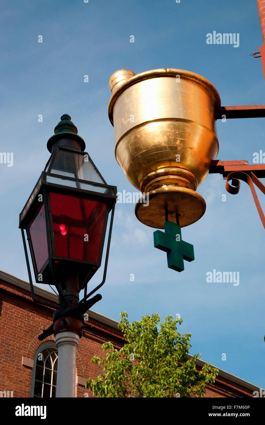 Gaslight and symbol for RX pharmacy on Hanover Street, historic North ...