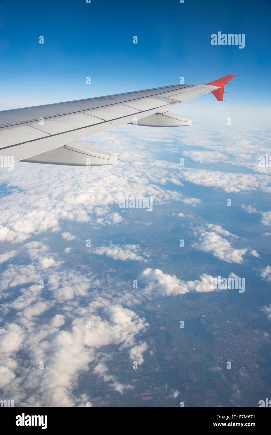 Airplane wing out of window Stock Photo - Alamy