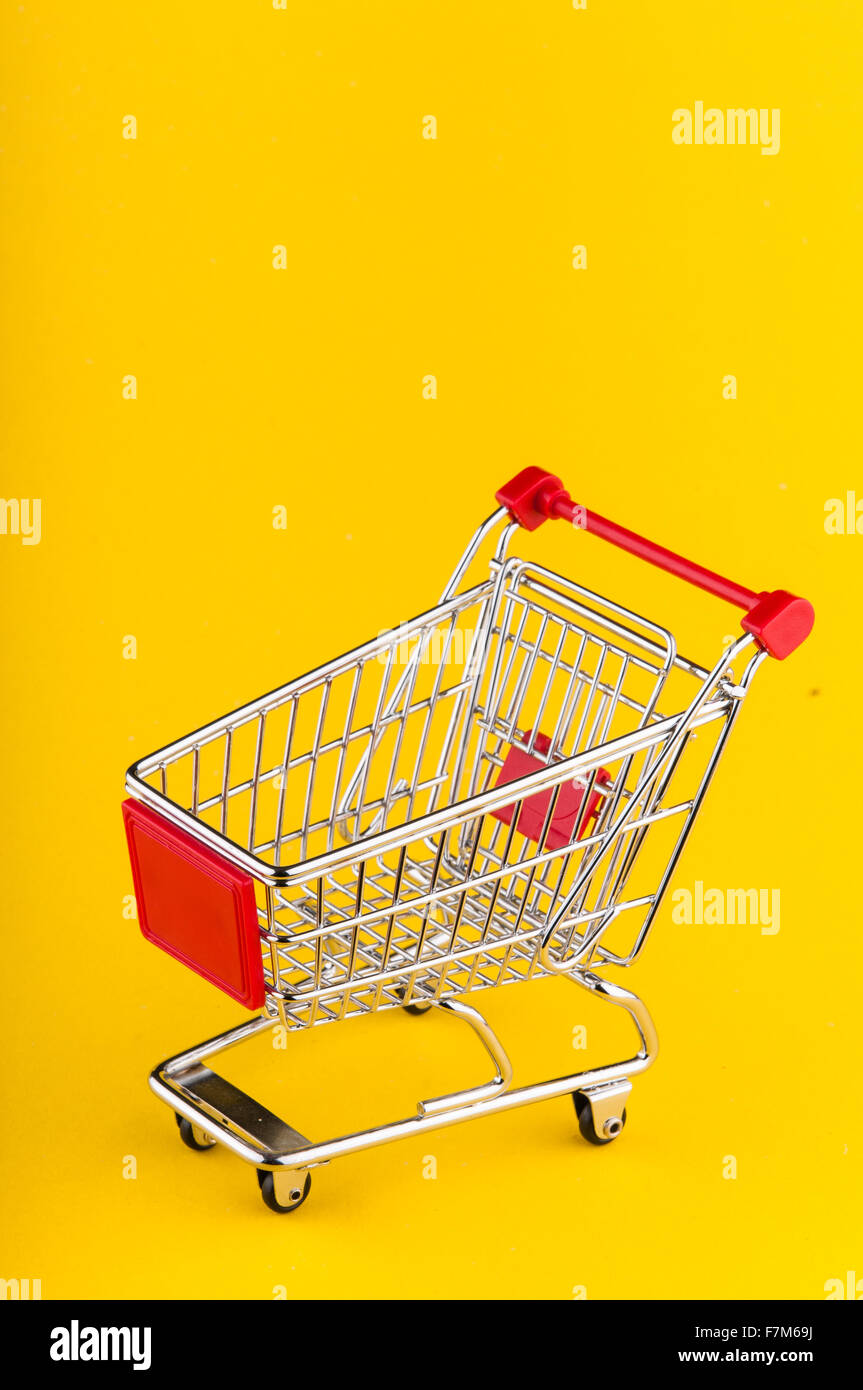 Shopping cart on seamless background Stock Photo - Alamy