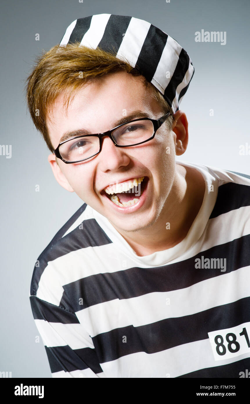 Funny prison inmate in concept Stock Photo - Alamy