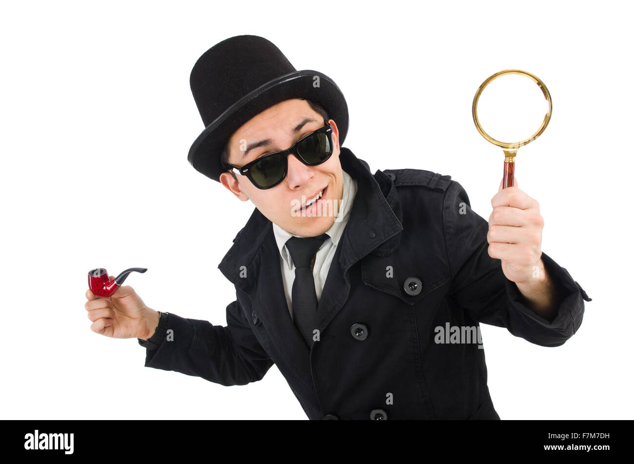 Young detective with pipe and magnifying glass Stock Photo - Alamy