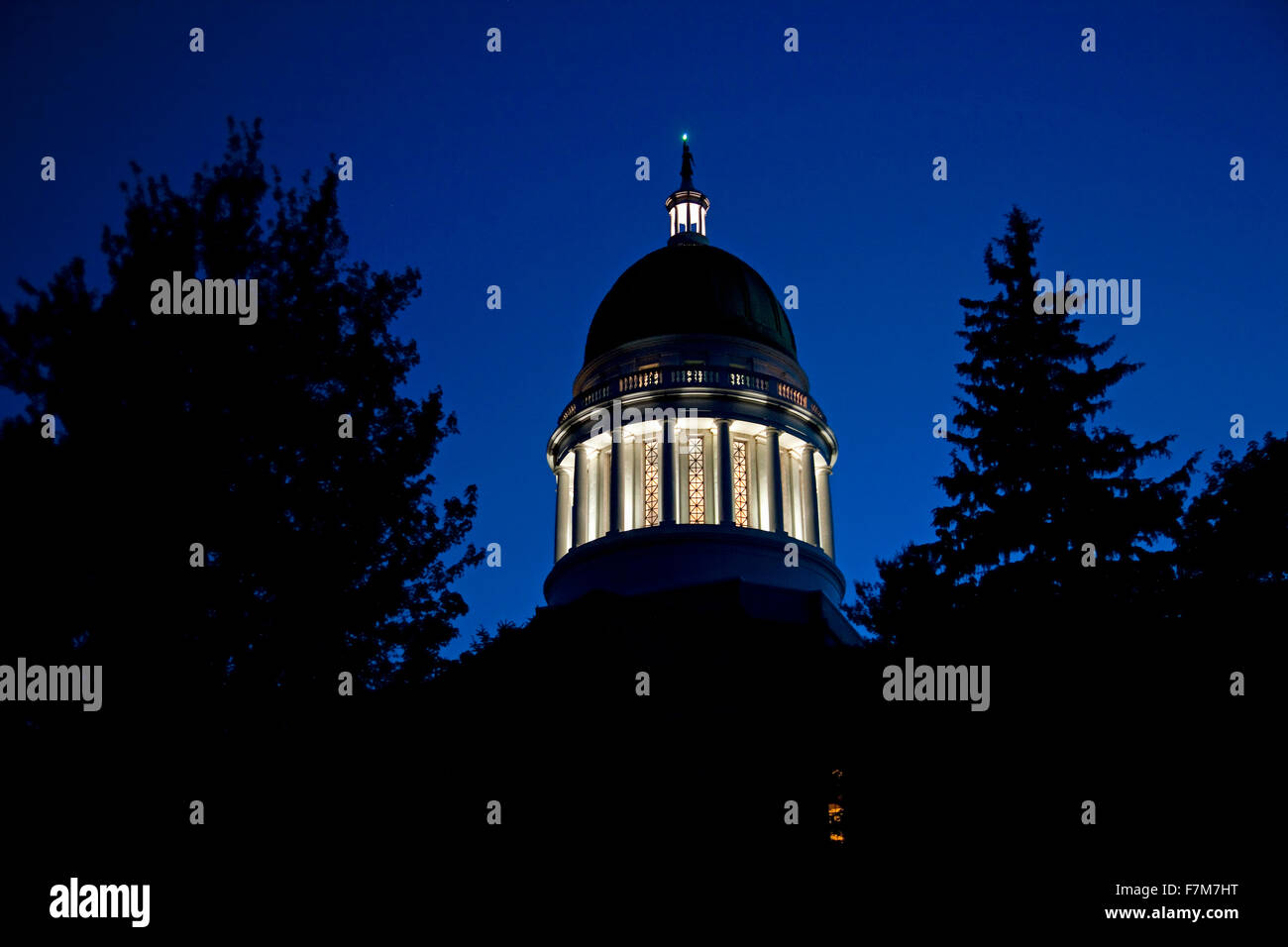 Historic Maine State Capitol Building at dusk with deep blue sky ...