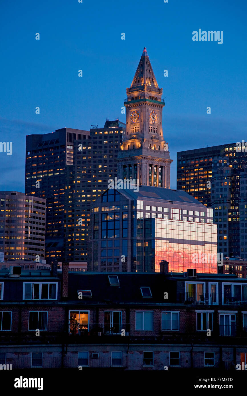 Sunset reflects in windows of Boston skyline Commerce House Tower shot ...
