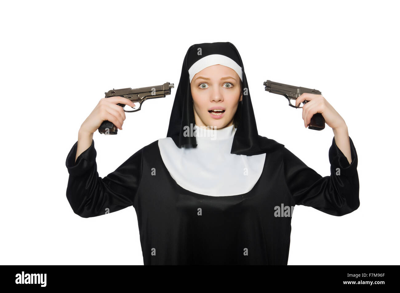 Nun with two guns isolated on white Stock Photo - Alamy