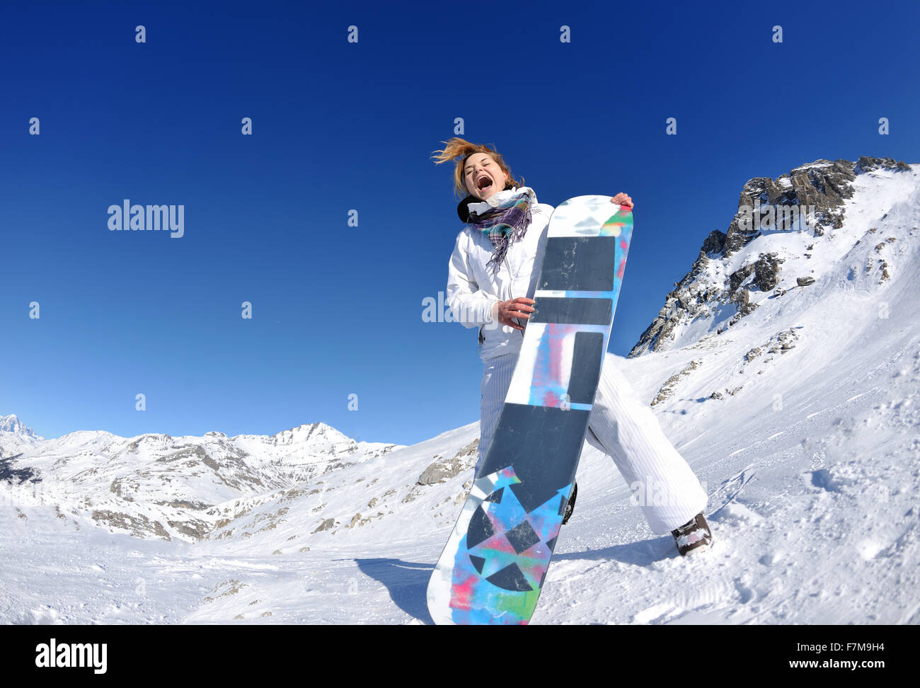 winter woman ski sport fun travel snow board Stock Photo - Alamy