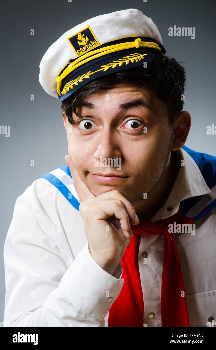Funny captain sailor wearing hat Stock Photo - Alamy