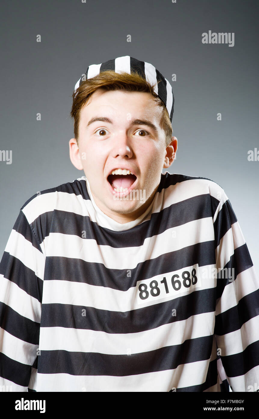 Funny prison inmate in concept Stock Photo - Alamy