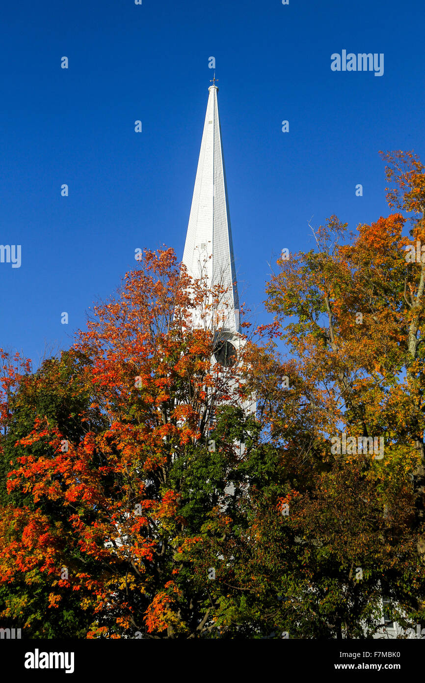 Church spire behind fall foliage, Manchester, Vermont, United States ...
