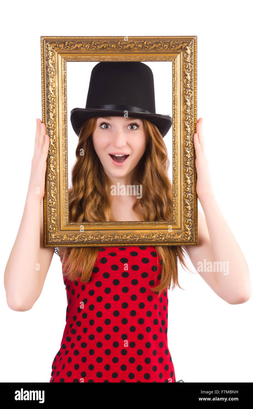 Pretty girl in red polka dot dress with picture frame isolated on white ...