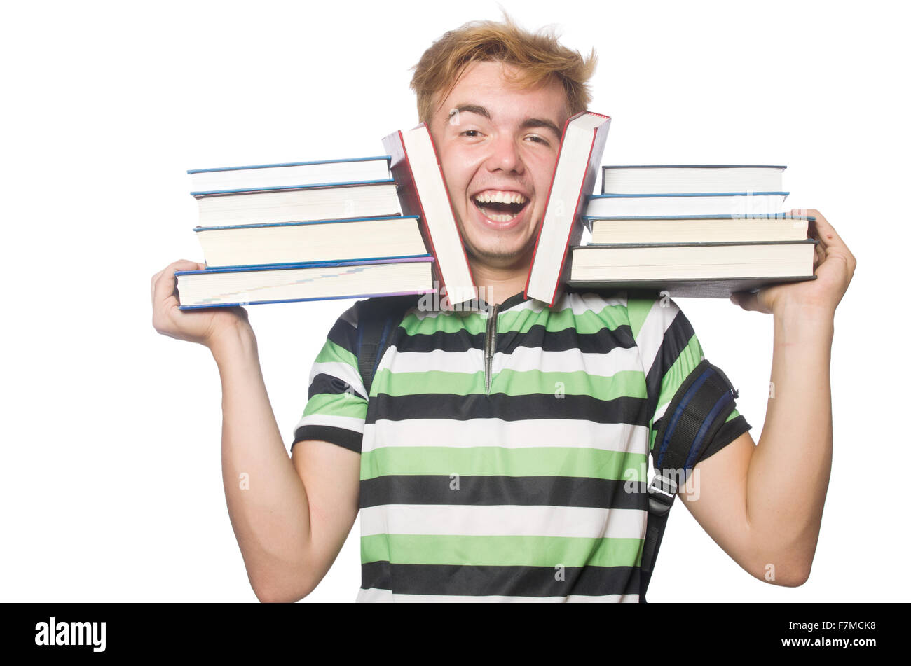 Funny student with stack of books Stock Photo - Alamy