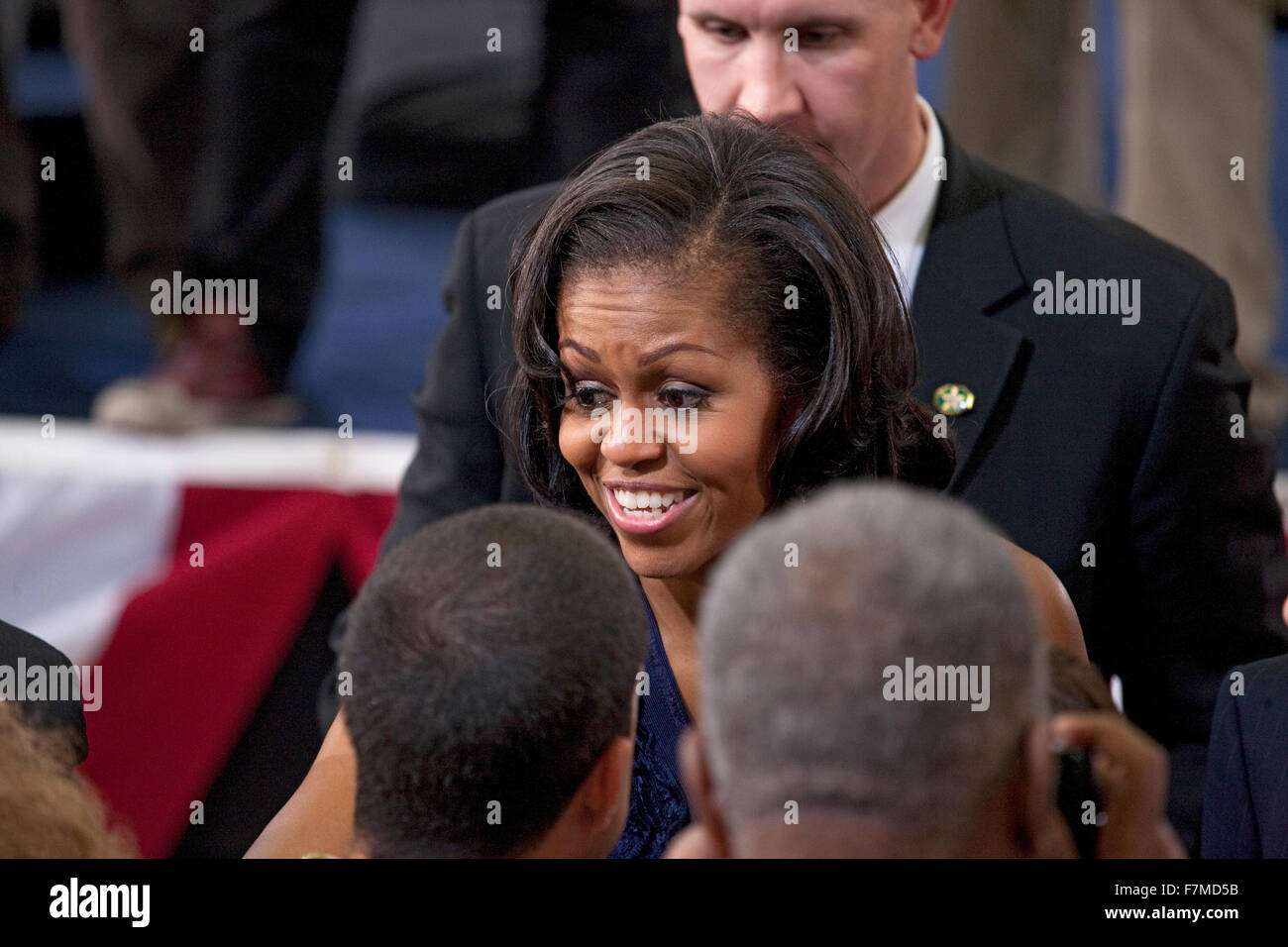 First Lady Michelle Obama shakes hands at President Obama campaign ...