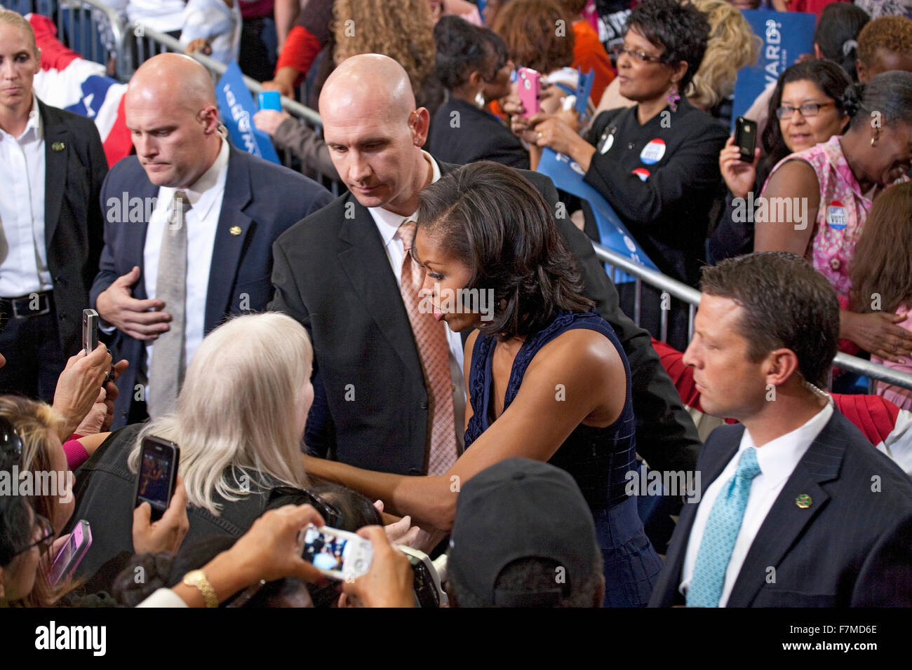 First Lady Michelle Obama shakes hands at President Obama campaign ...