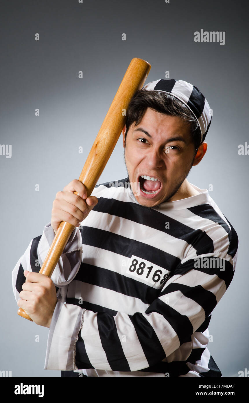Funny prison inmate in concept Stock Photo - Alamy