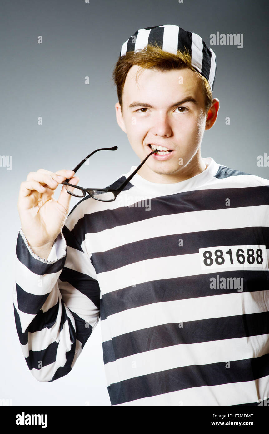 Funny prison inmate in concept Stock Photo - Alamy