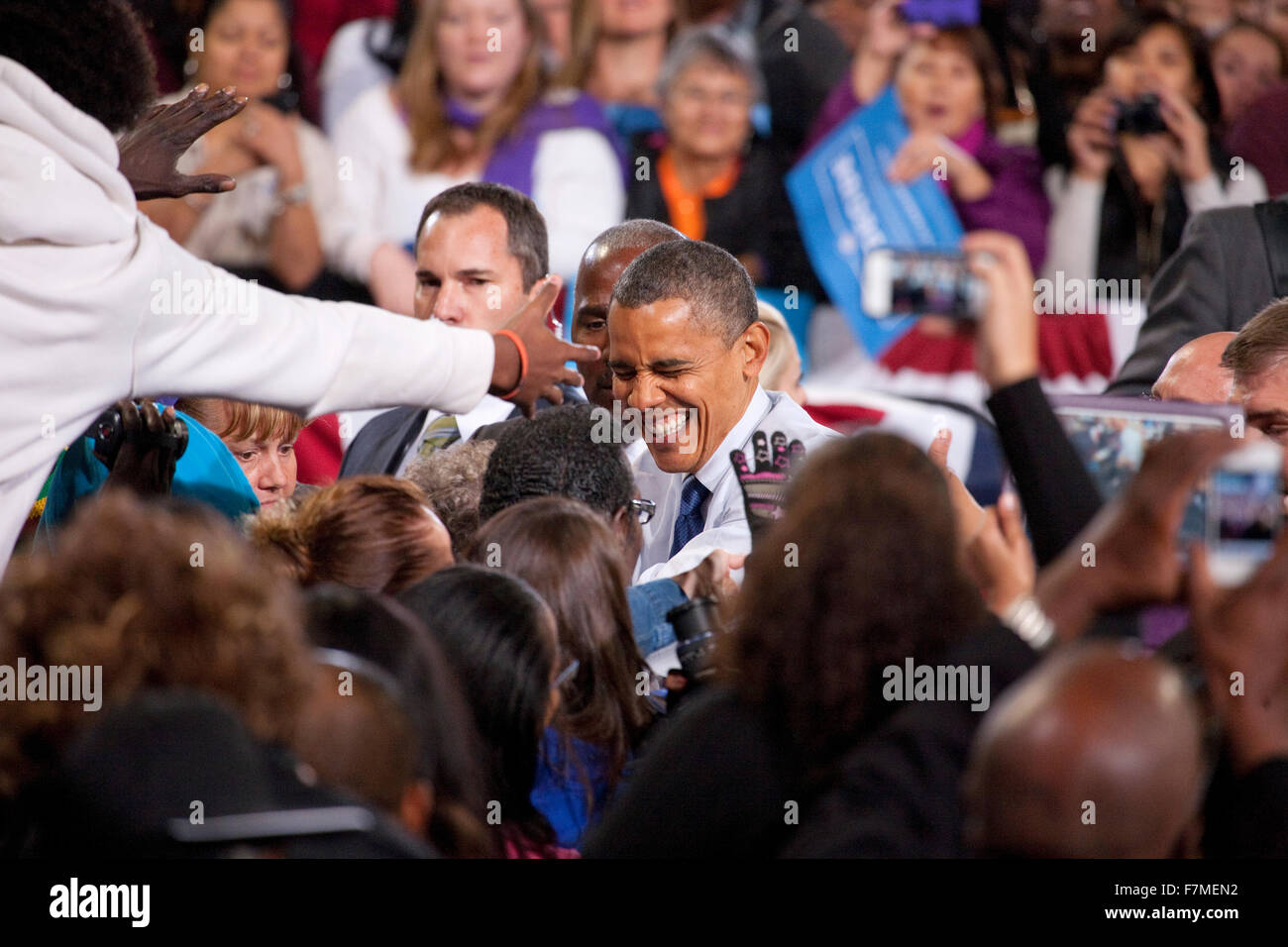 President Barack Obama shakes hands at Presidential Campaign Rally ...