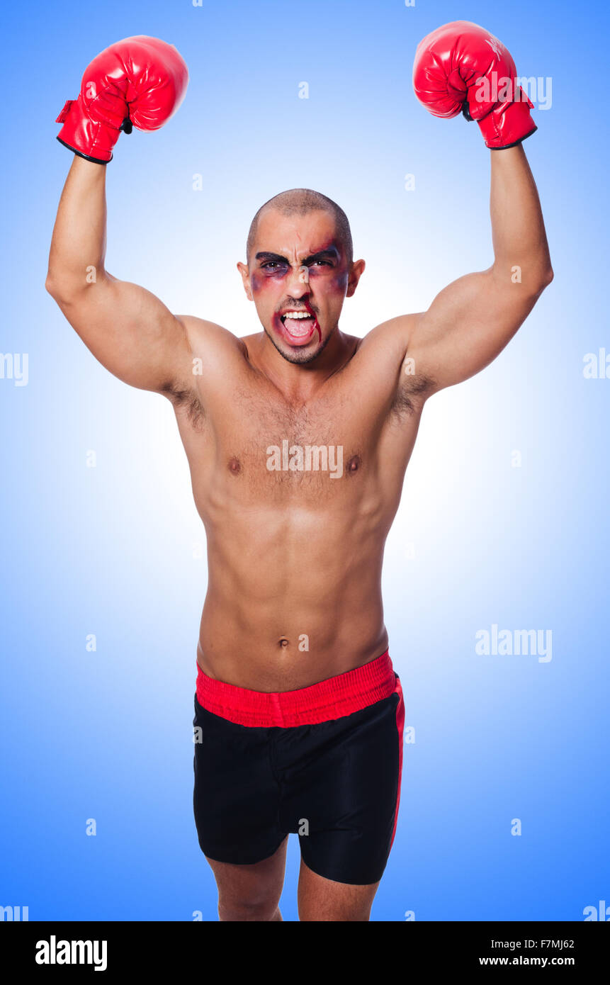 Badly beaten boxer isolated on white Stock Photo - Alamy