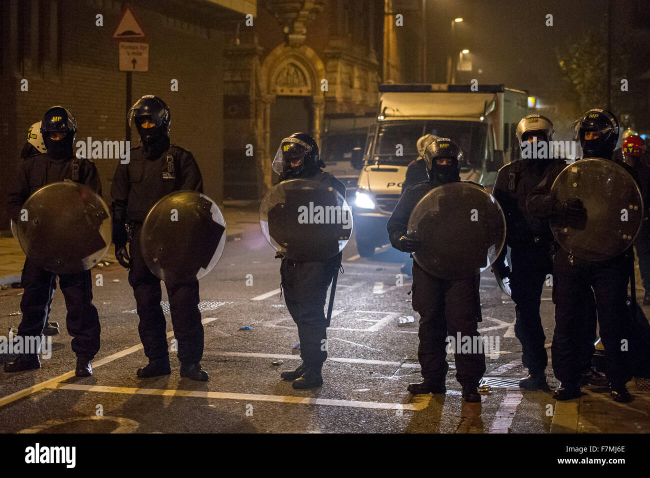 Hundreds of riot police guard the streets after the disorder in Lambeth ...