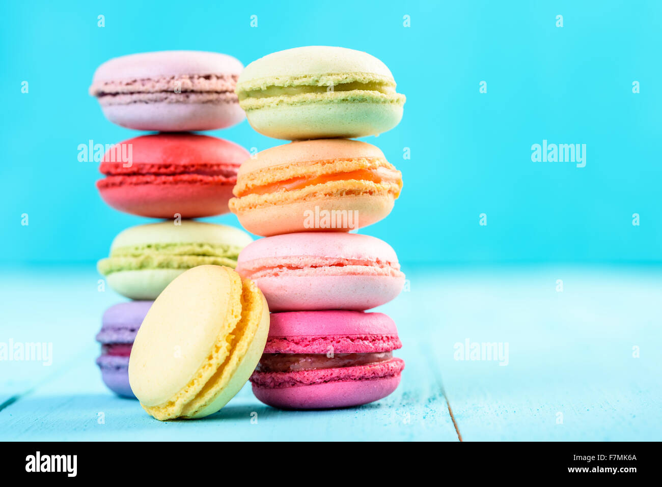 French Macaroons On Blue Background Stock Photo - Alamy