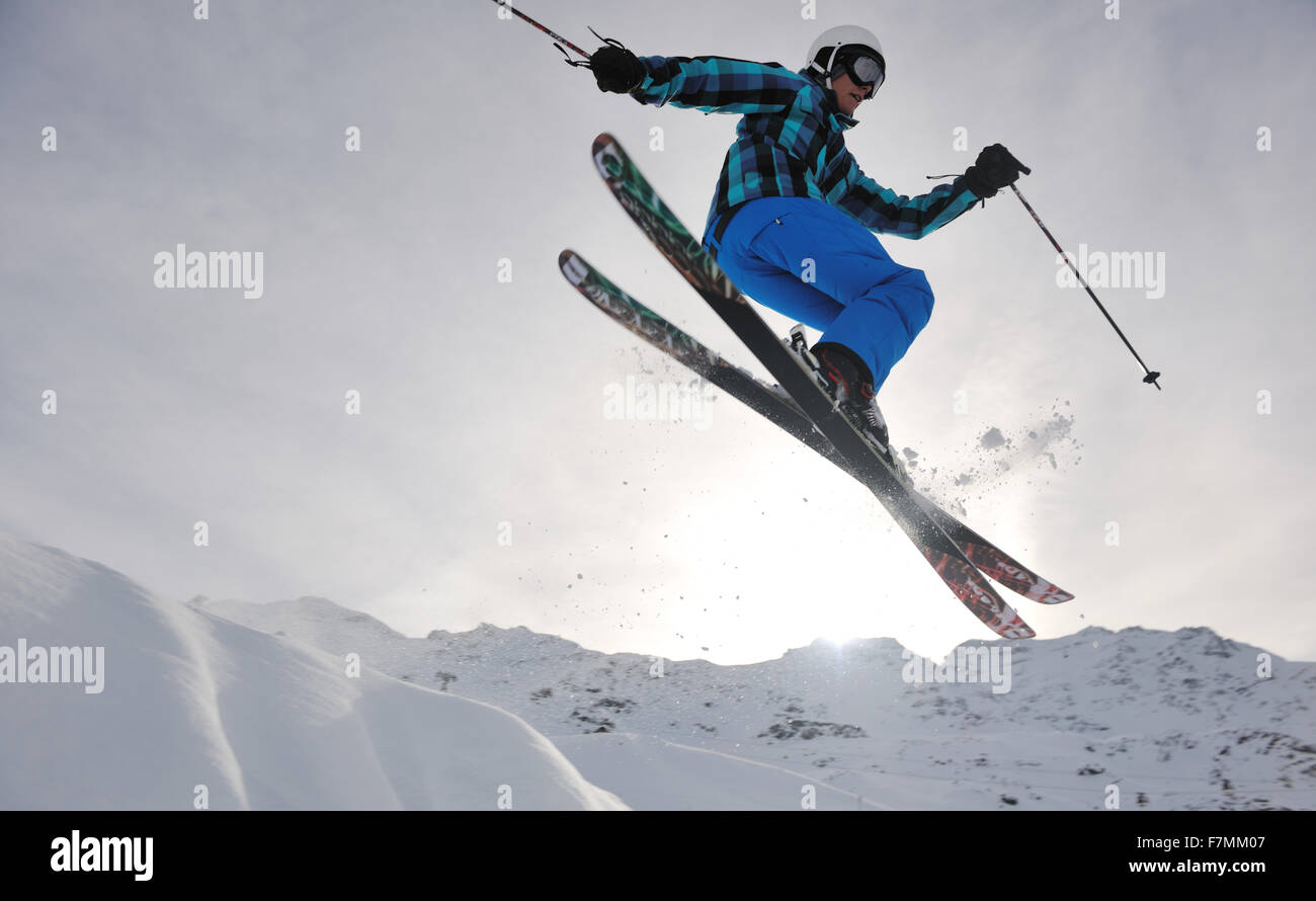 extreme freestyle ski jump with young man at mountain in snow park at winter season Stock Photo ...