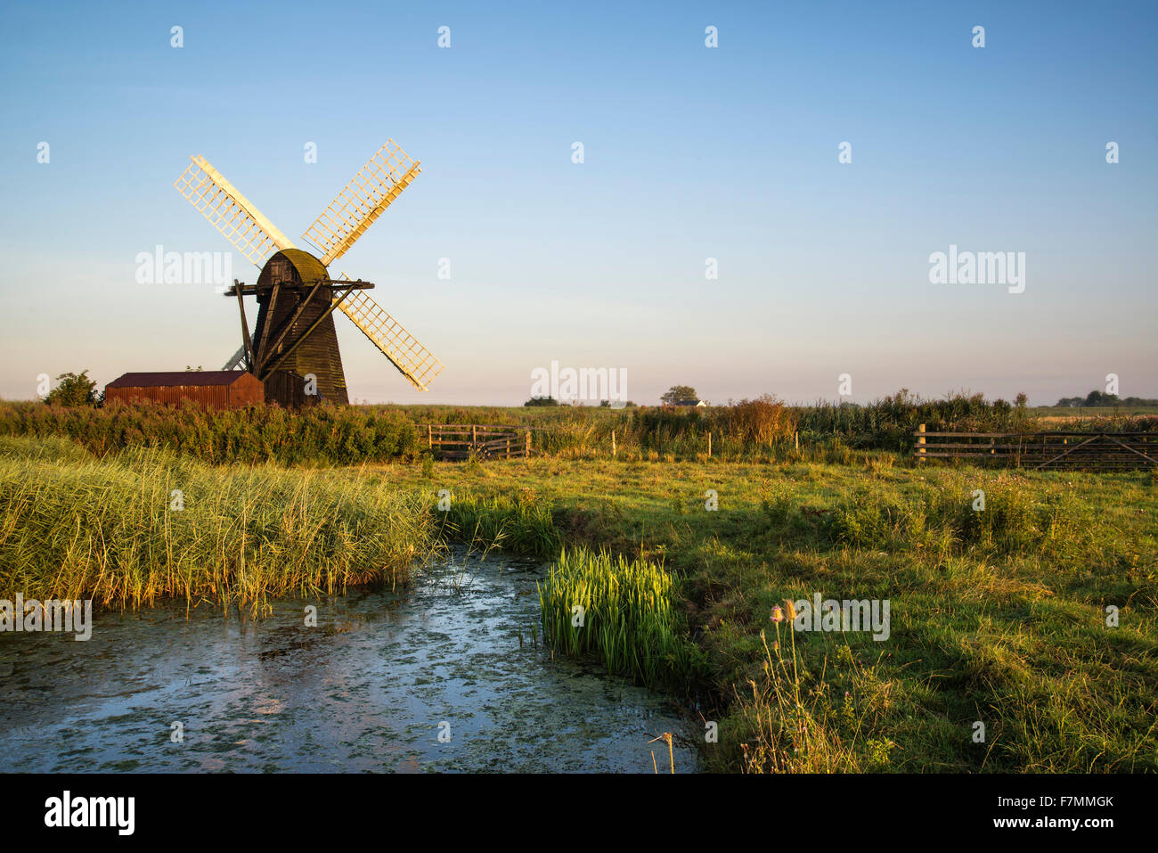 Old drainage pump windmill in English countryside landscape Stock Photo ...
