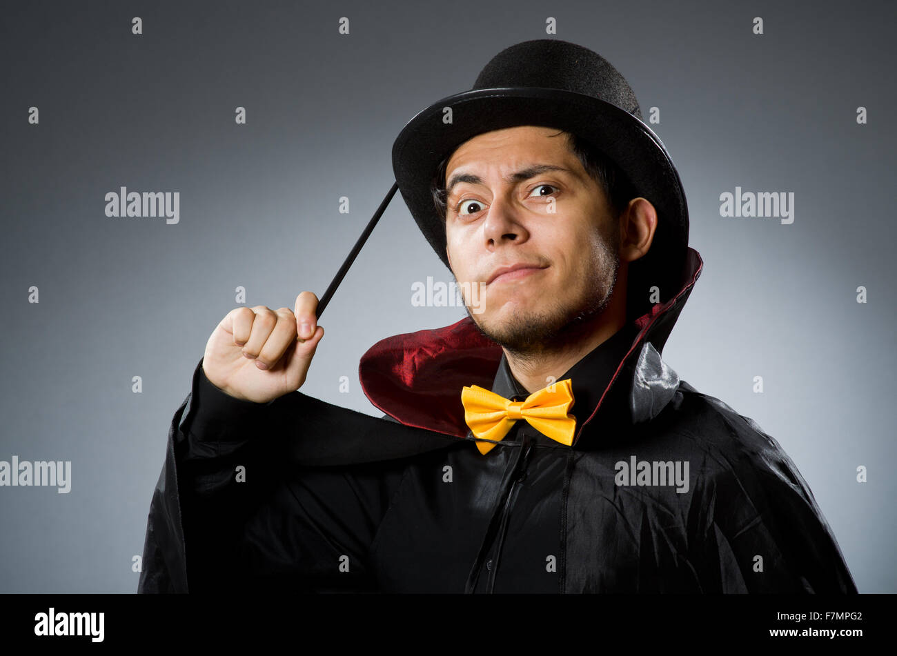 Funny magician man with wand and hat Stock Photo - Alamy