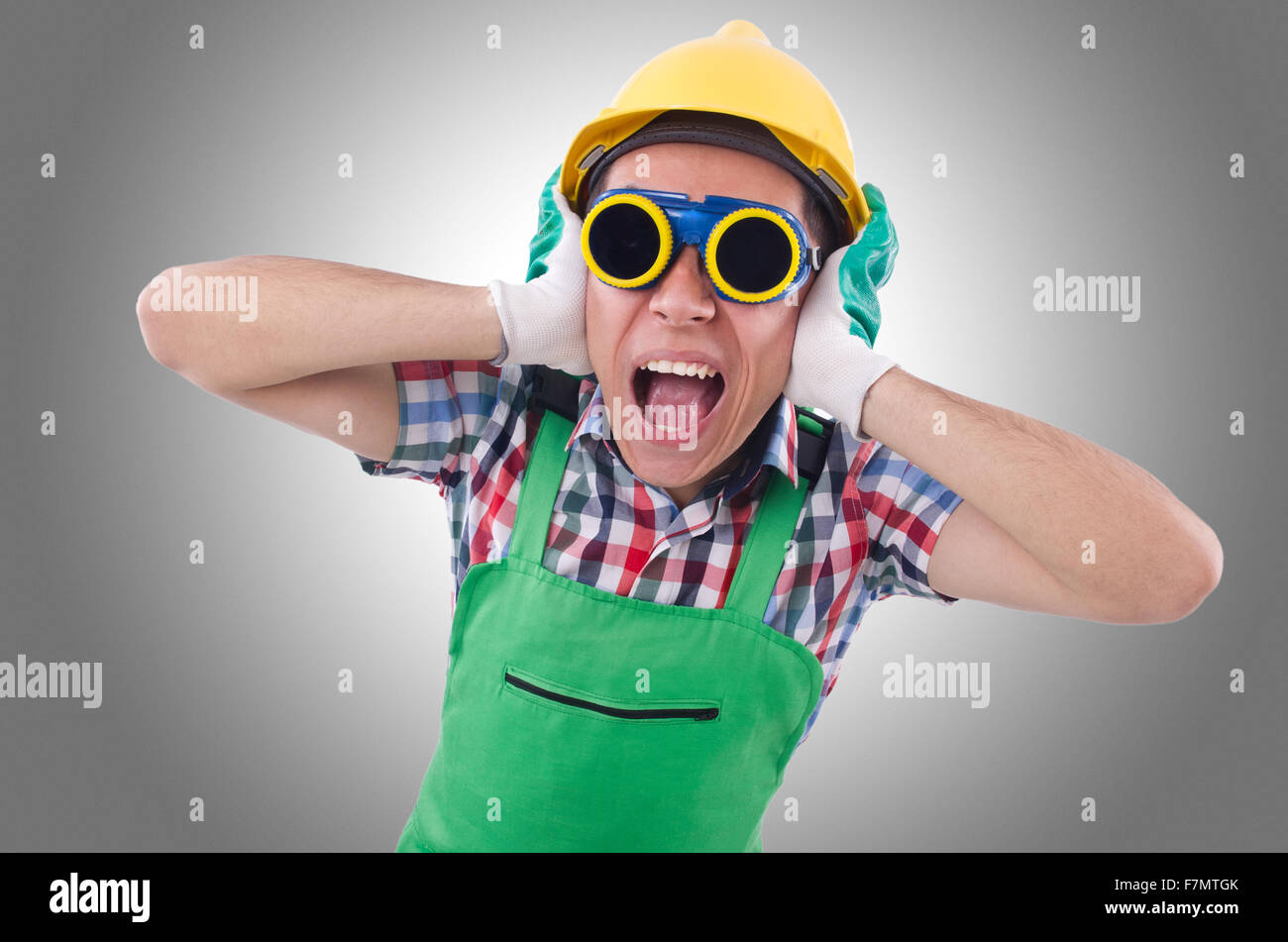 Funny construction worker isolated on white Stock Photo - Alamy