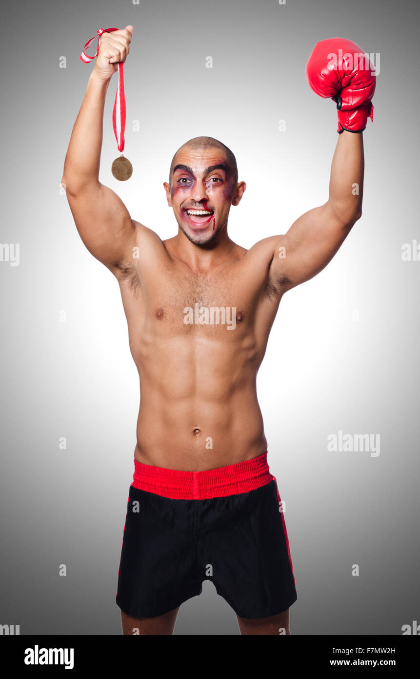 Badly beaten boxer isolated on white Stock Photo - Alamy