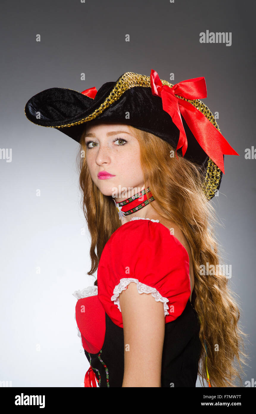 Woman pirate wearing hat and costume Stock Photo - Alamy