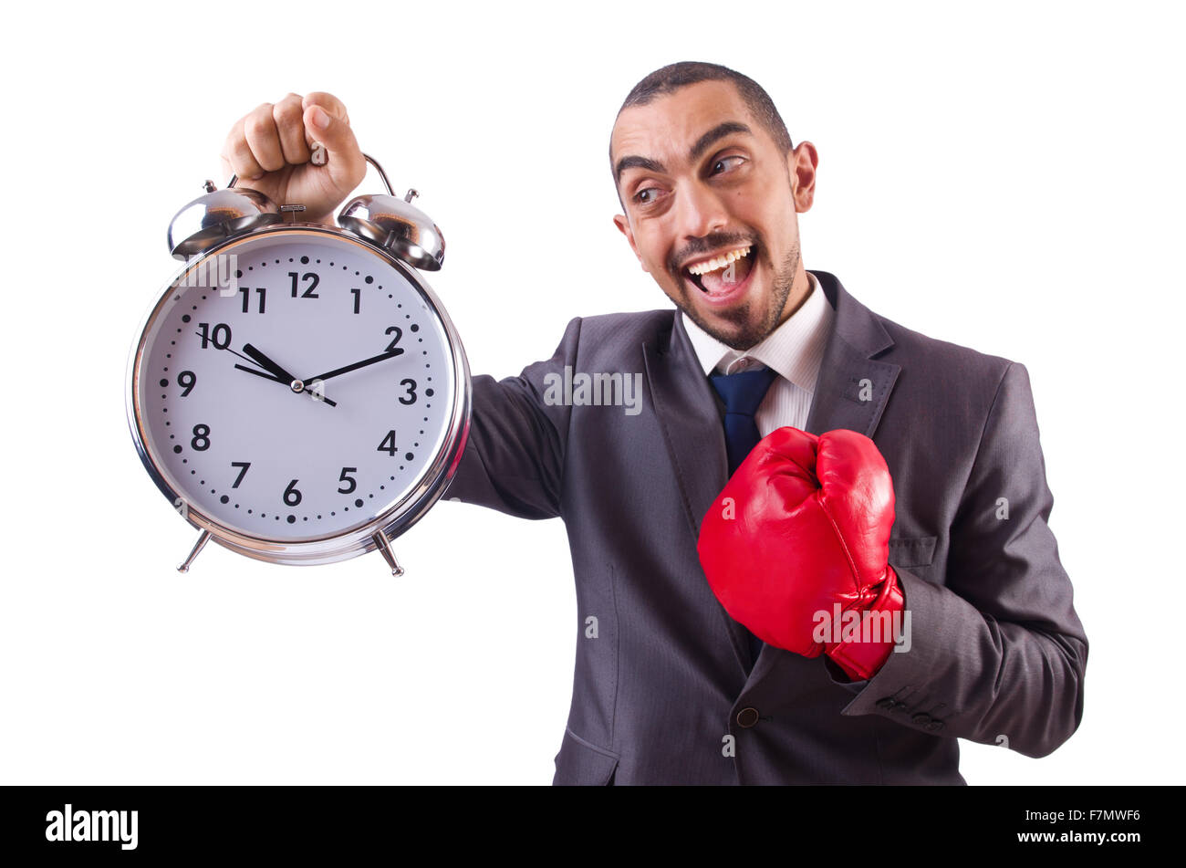 Angry businessman hitting clock isolated on white Stock Photo - Alamy