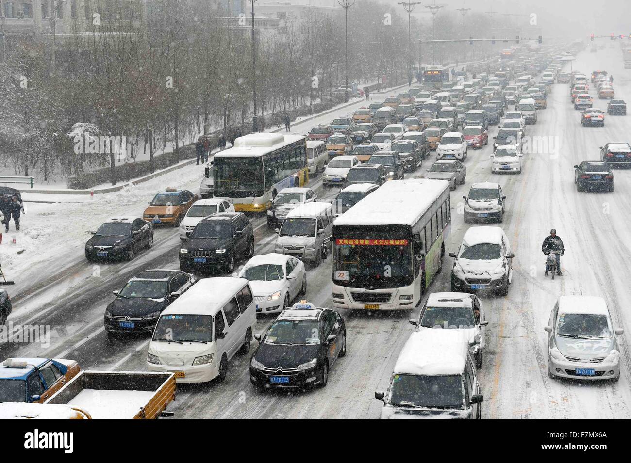 Harbin, China's Heilongjiang Province. 2nd Dec, 2015. Vehicles move on ...