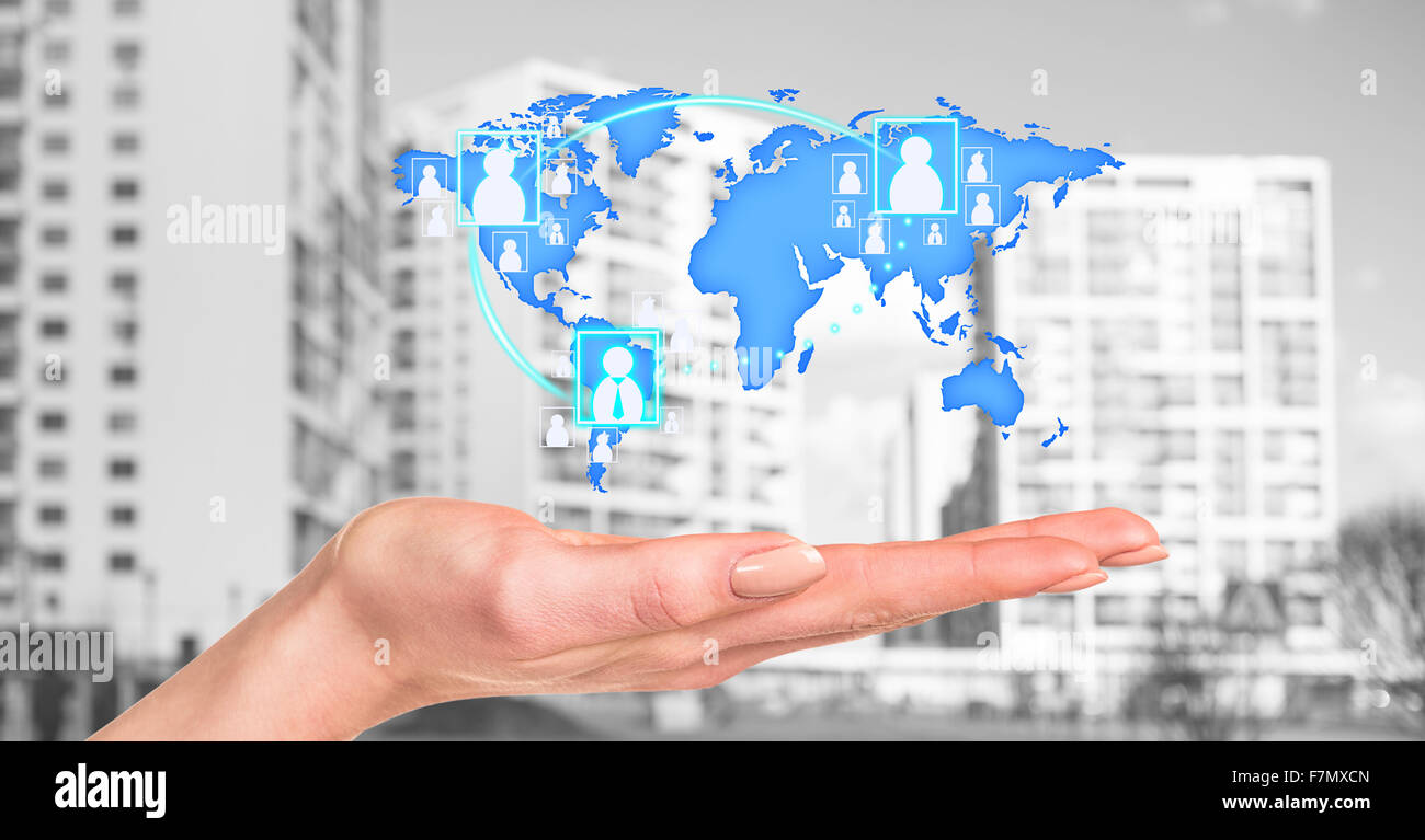 Human hand holds map projection with icons Stock Photo - Alamy