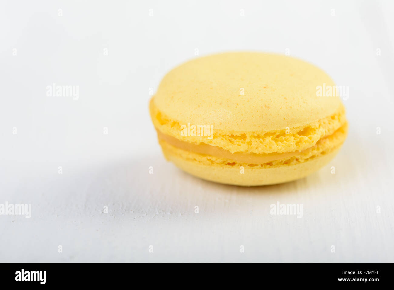 Yellow Lemon French Macaroon On White Wood Boards Background Stock ...