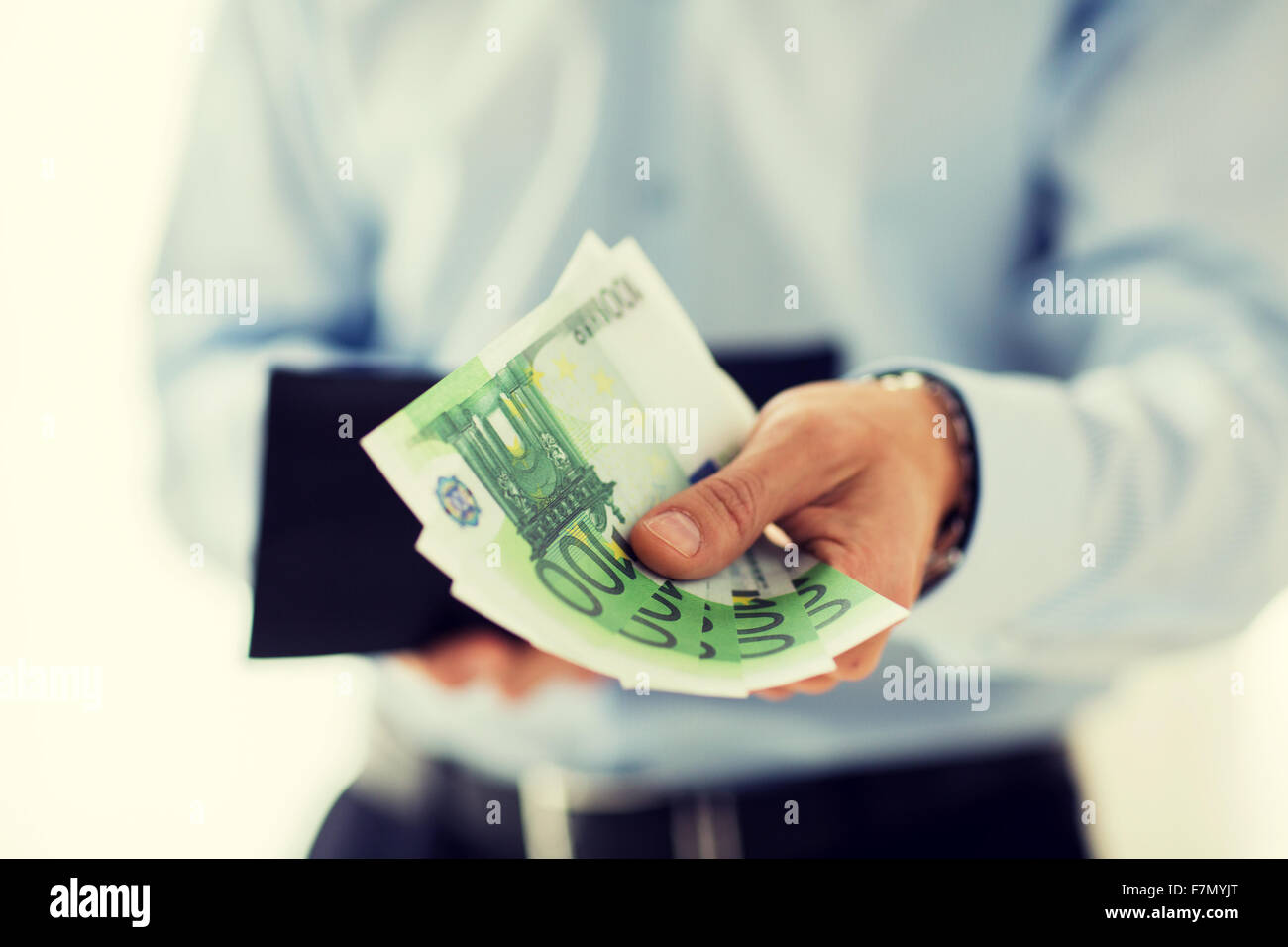 Wallet 100 euro hand hi-res stock photography and images - Alamy