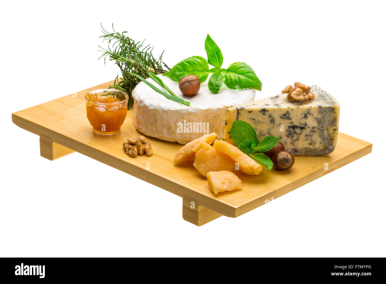 Assorted cheese - brie, dor blue and hard old yellow cheese Stock Photo ...