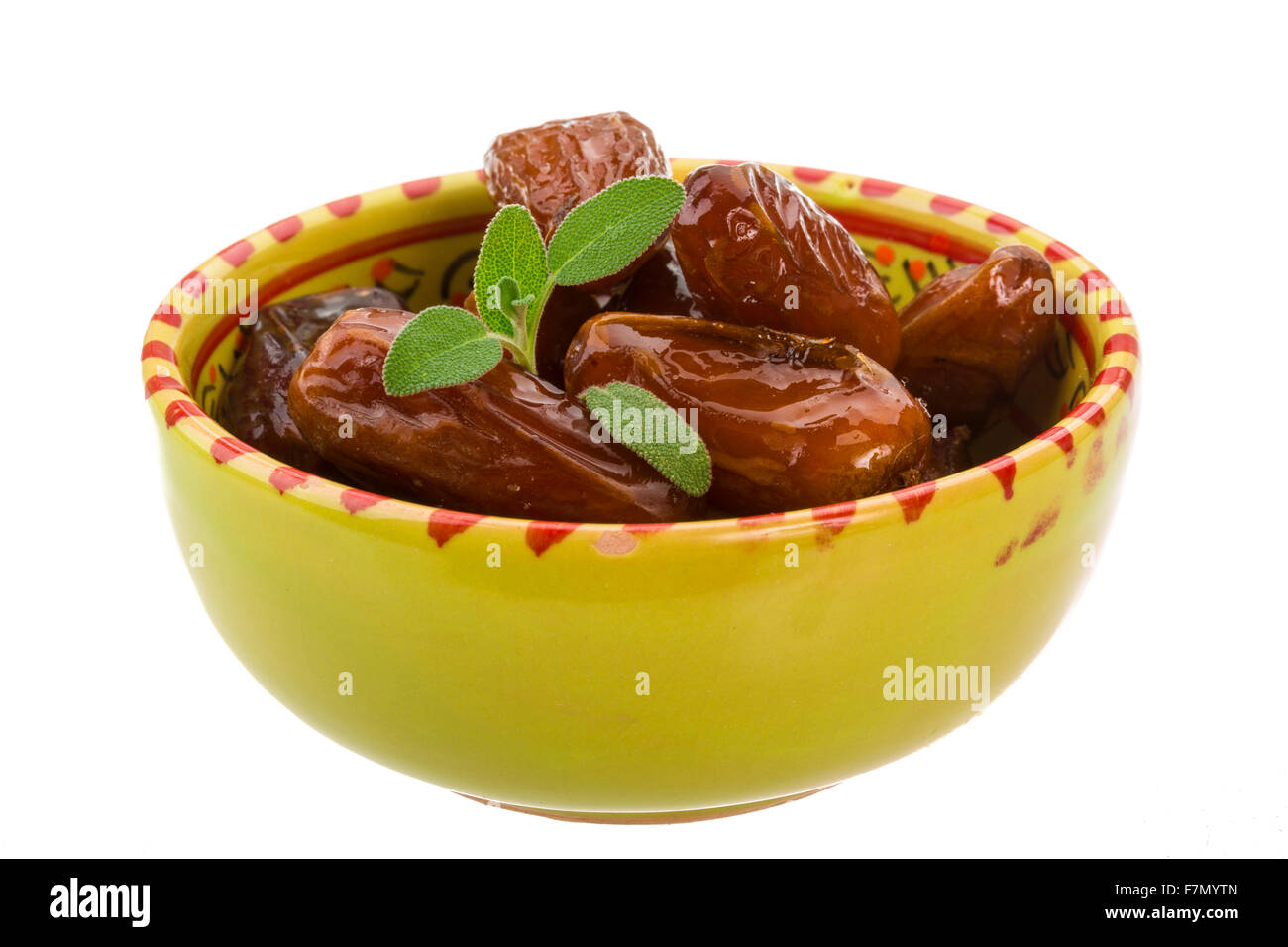 Dates with leaf on the plate Stock Photo - Alamy
