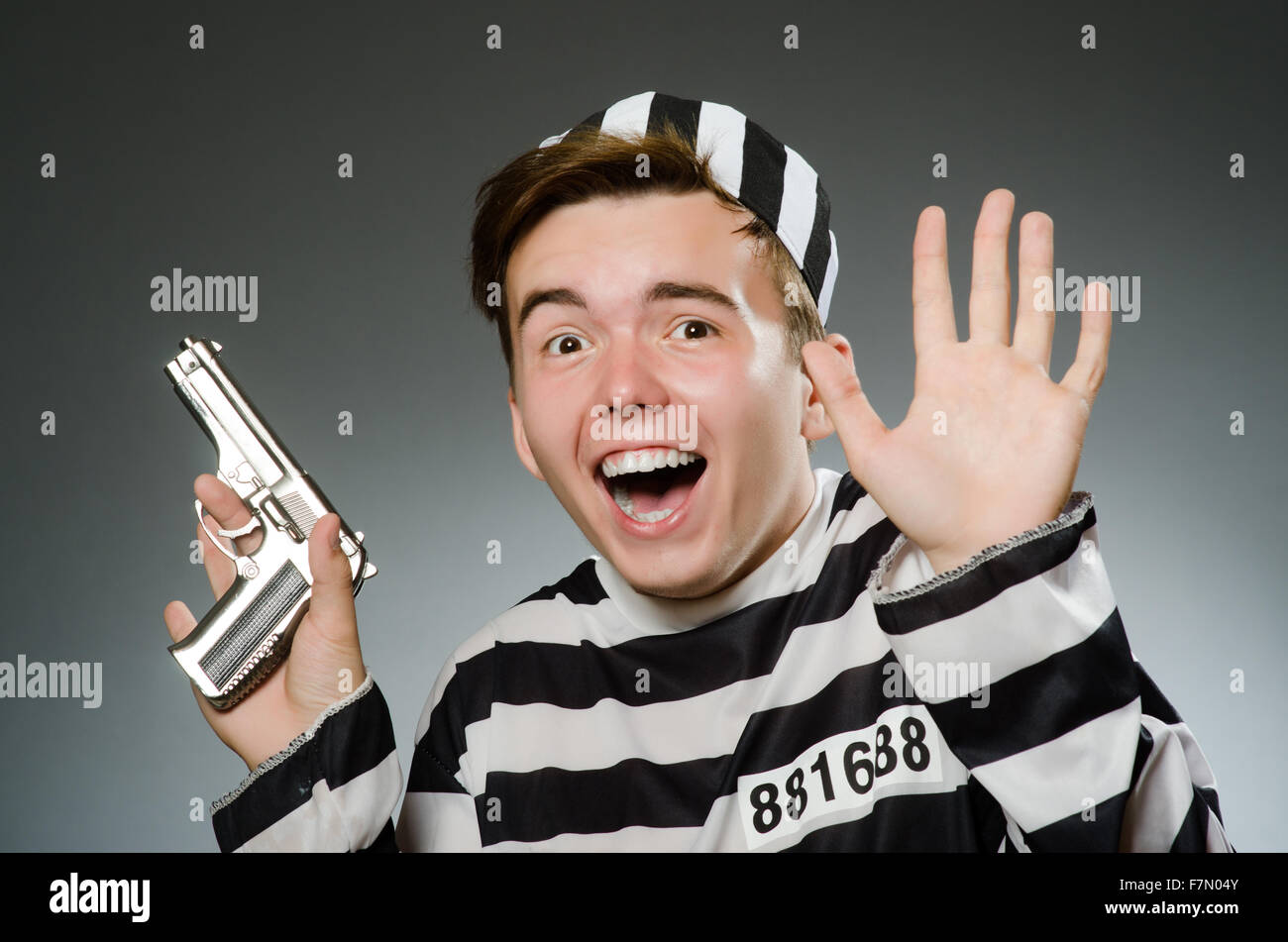 Prison inmate in funny concept Stock Photo - Alamy