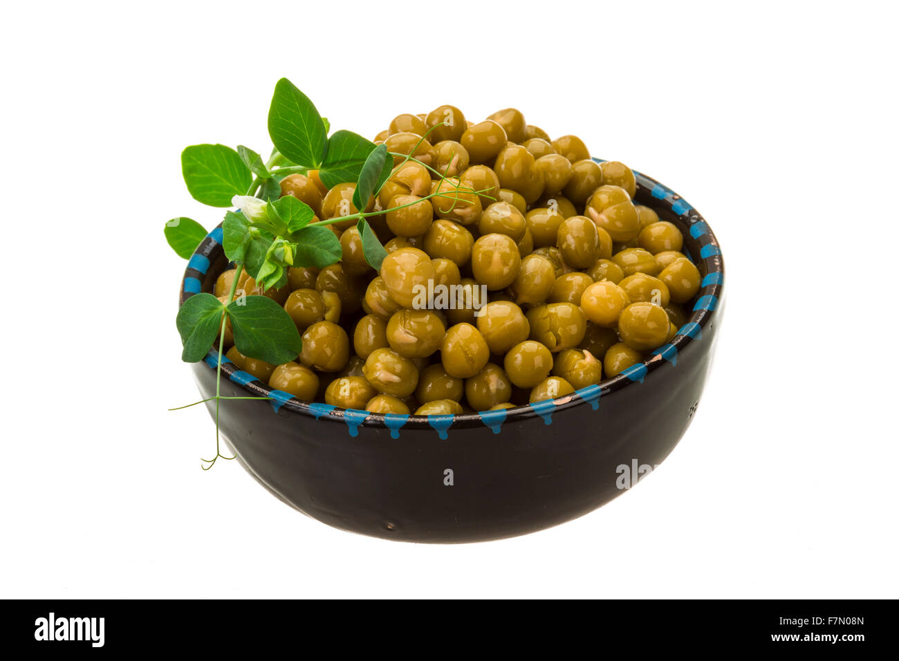 Marinated green peas with branch Stock Photo - Alamy