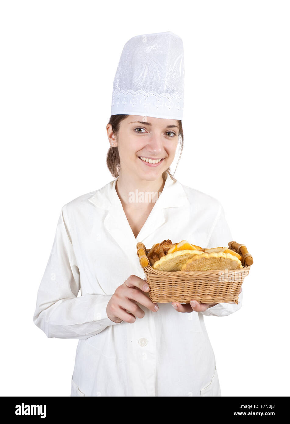 Portrait of female cook with pastry over white Stock Photo - Alamy