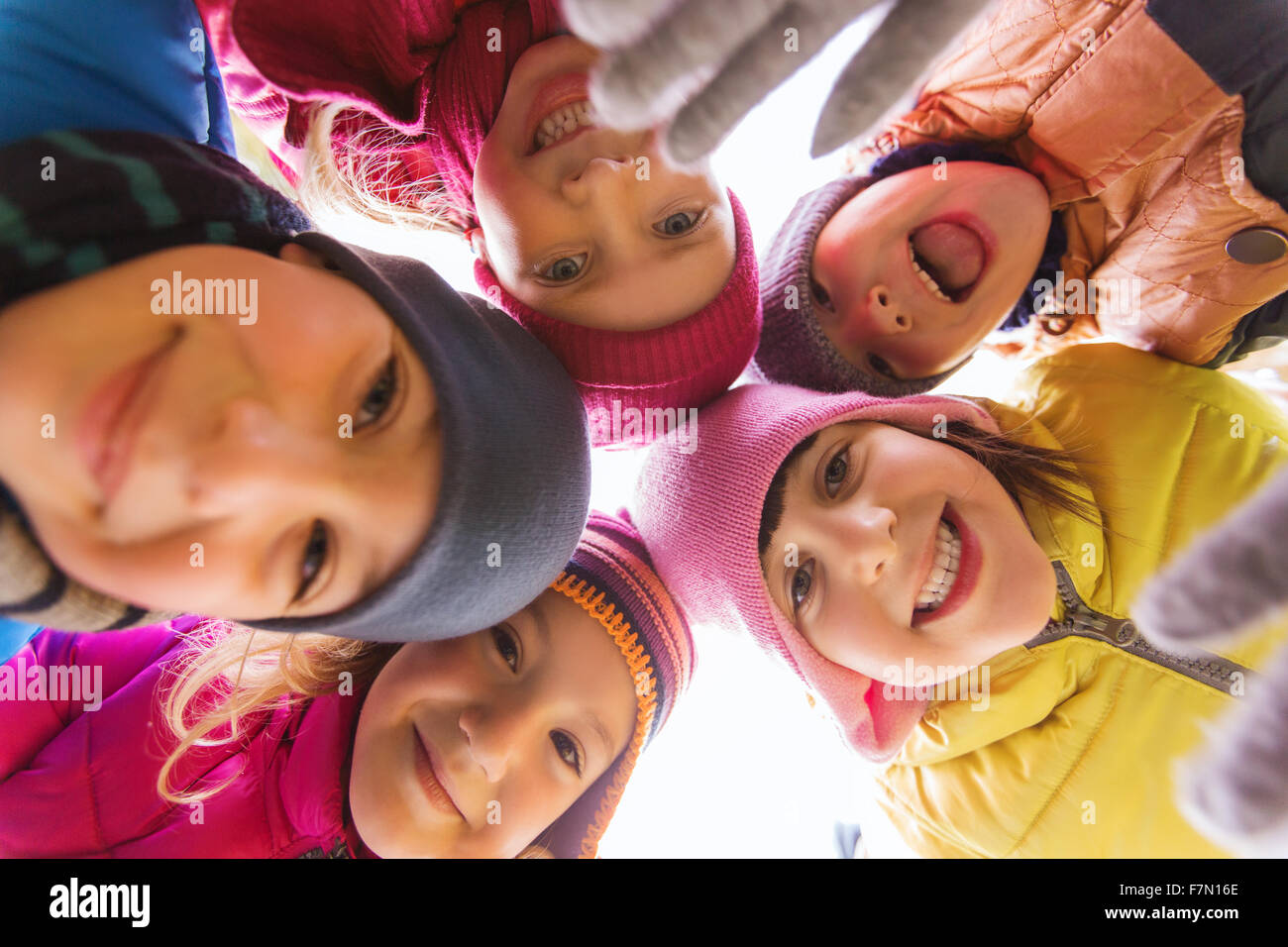 group of happy children faces in circle Stock Photo - Alamy