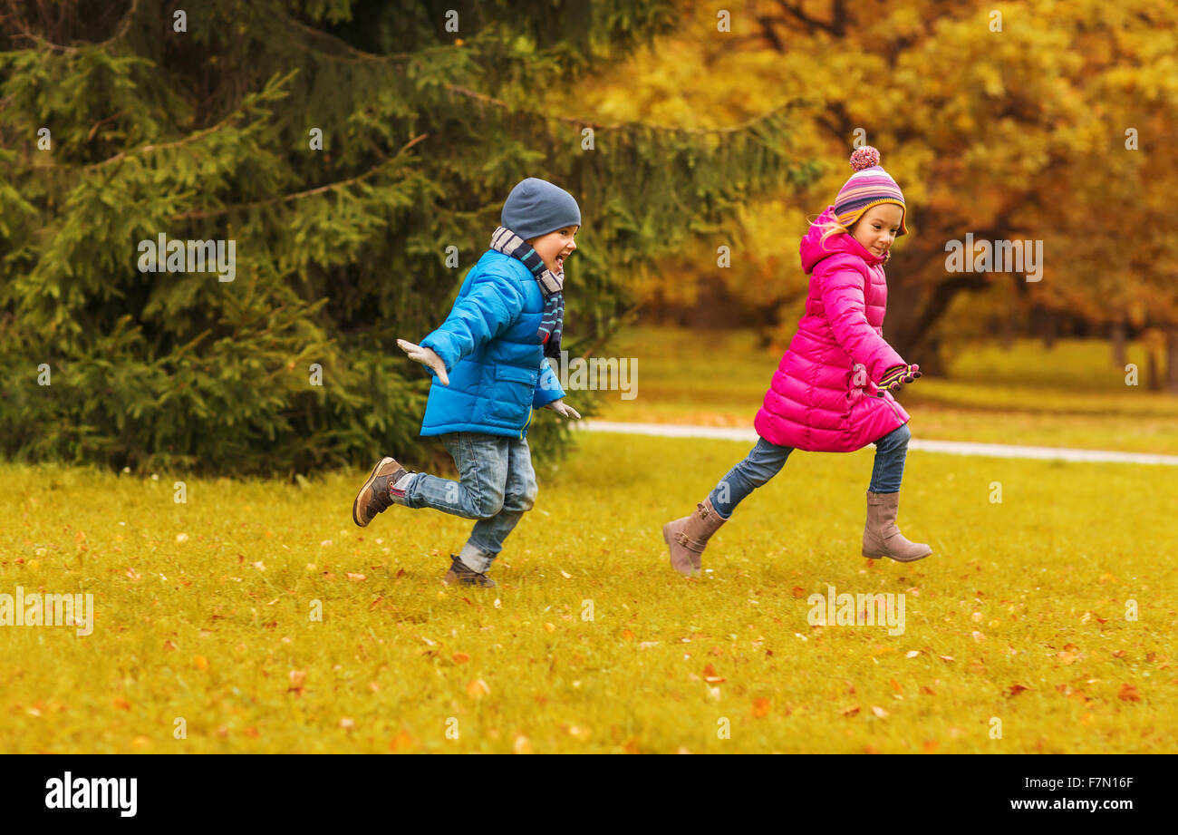 group of happy little kids running outdoors Stock Photo - Alamy