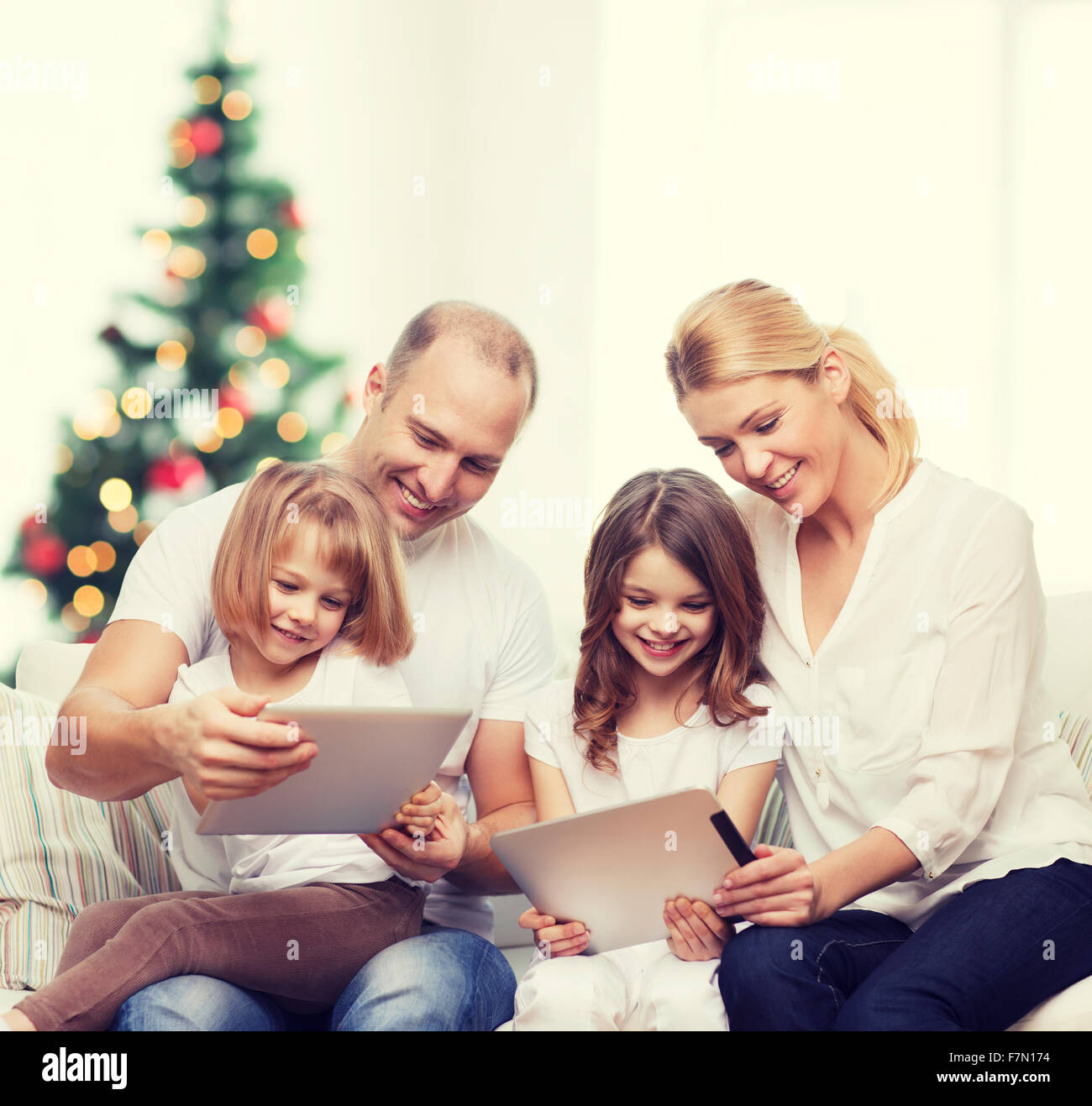happy family with tablet pc computers Stock Photo - Alamy