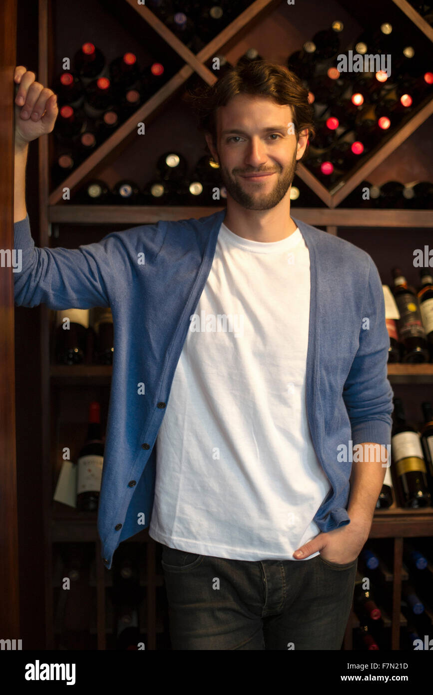 Salesman in wine shop, portrait Stock Photo - Alamy