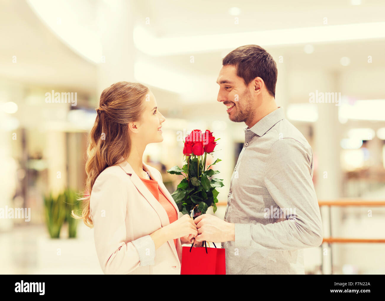 Young happy couple customers hi-res stock photography and images - Alamy