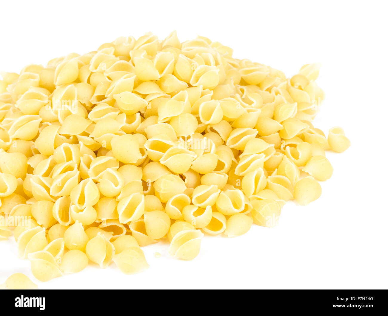 Heap of raw pasta (conchiglie Stock Photo - Alamy