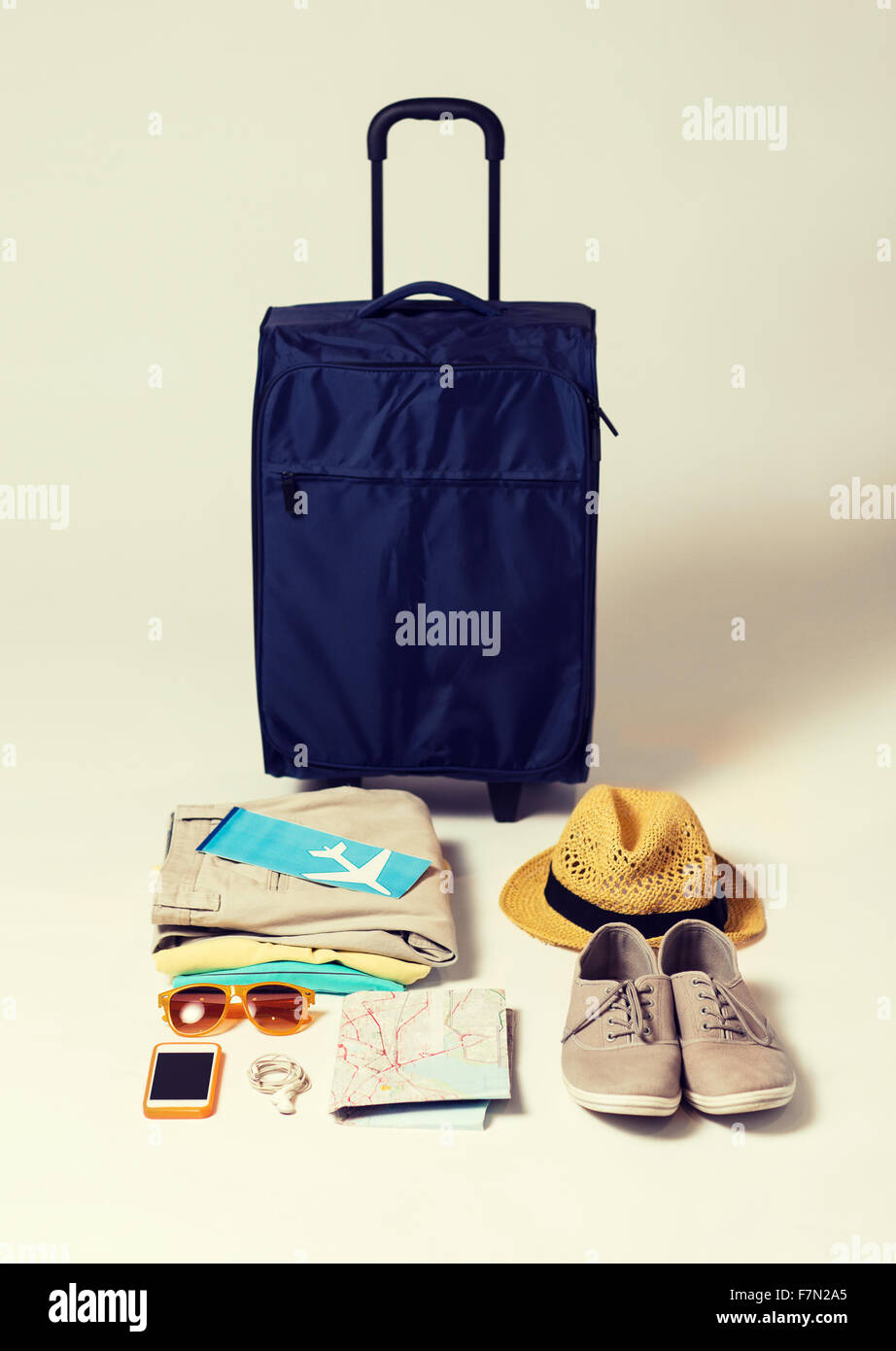travel bag and personal stuff Stock Photo - Alamy
