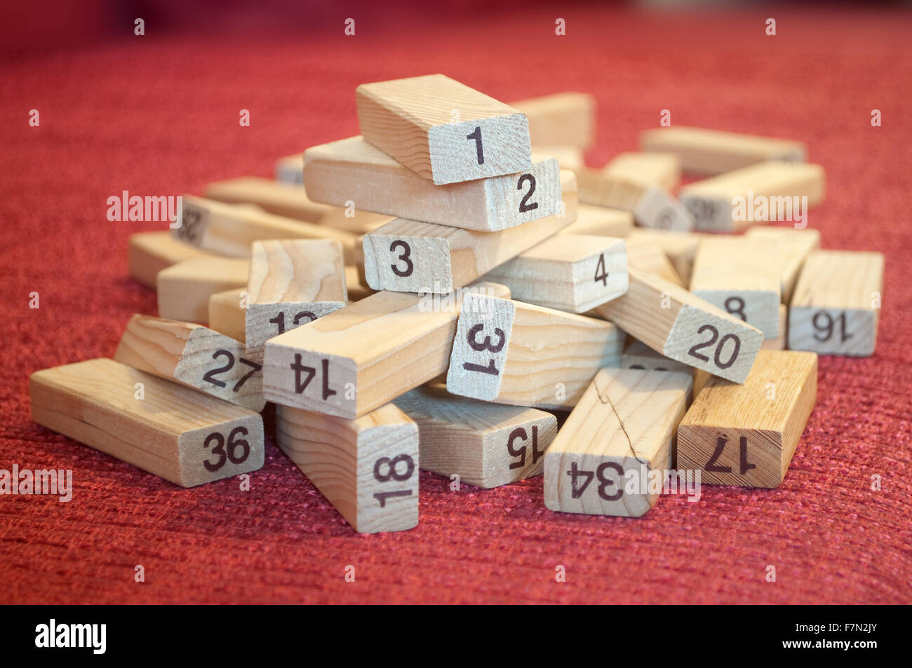 A pile of wooden blocks with printed number showing concept of the ...