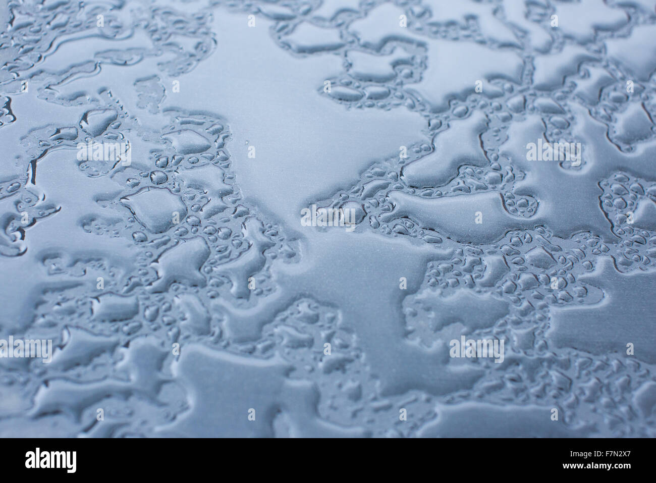Wet metal surface hi-res stock photography and images - Alamy