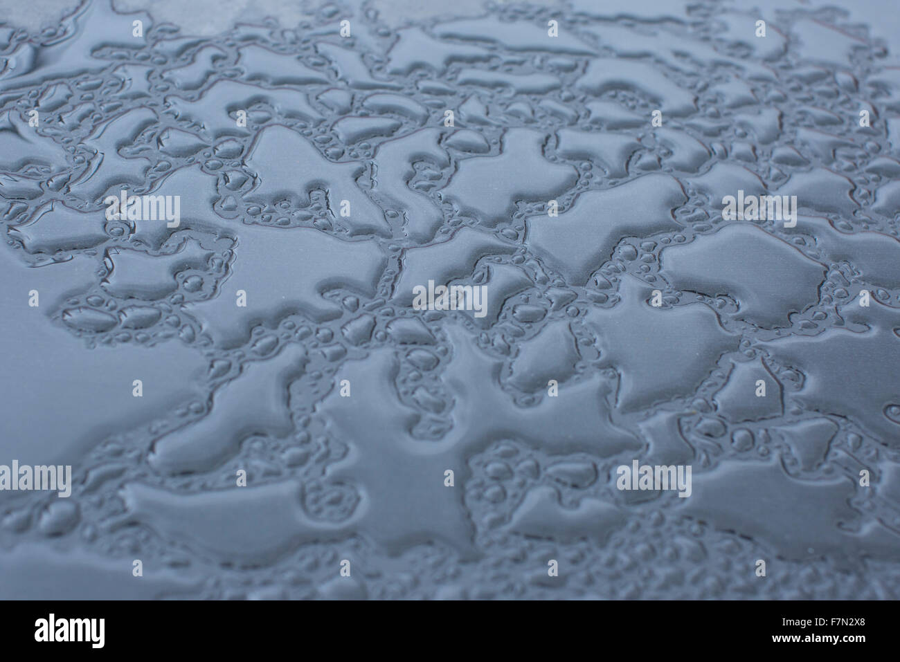 Wet metal surface Stock Photo - Alamy
