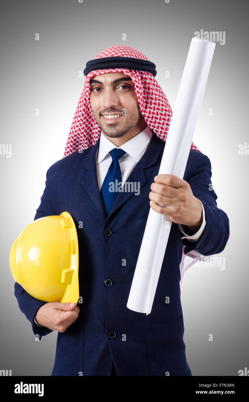 Arab engineer with drawings on white Stock Photo - Alamy