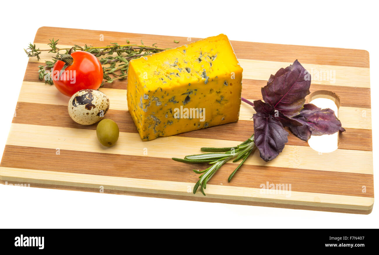 Yellow cheese with blue mold Stock Photo - Alamy
